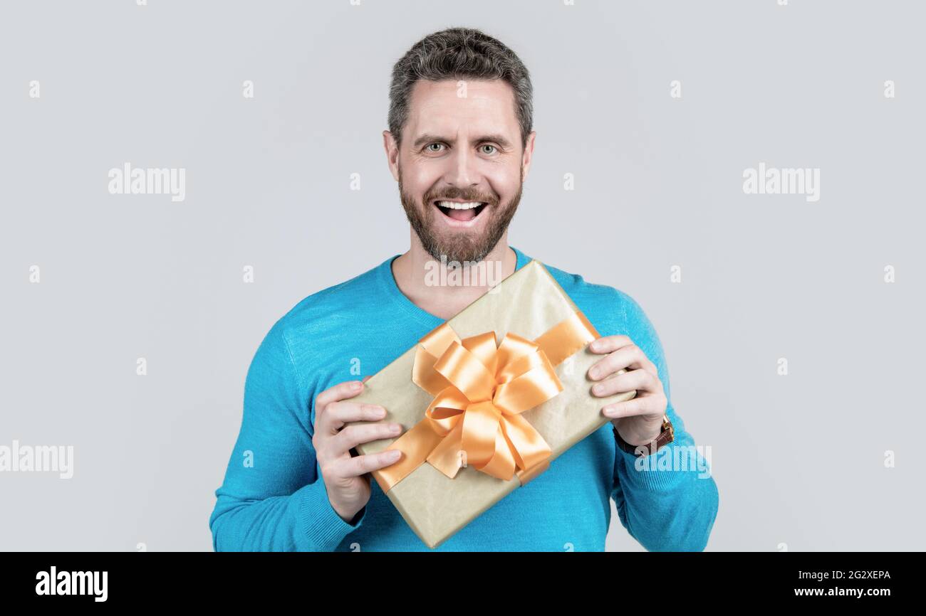 valentines day happiness. boxing day. happy handsome man with present ...