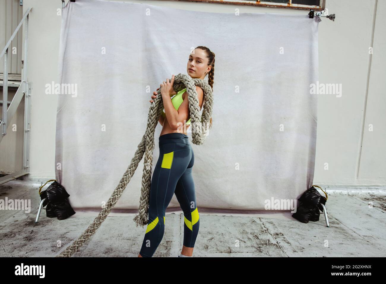 Fitness woman cross hi-res stock photography and images - Alamy