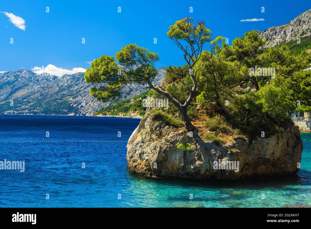 Wonderful scenery with clean sea and famous rock island in the Adriatic ...