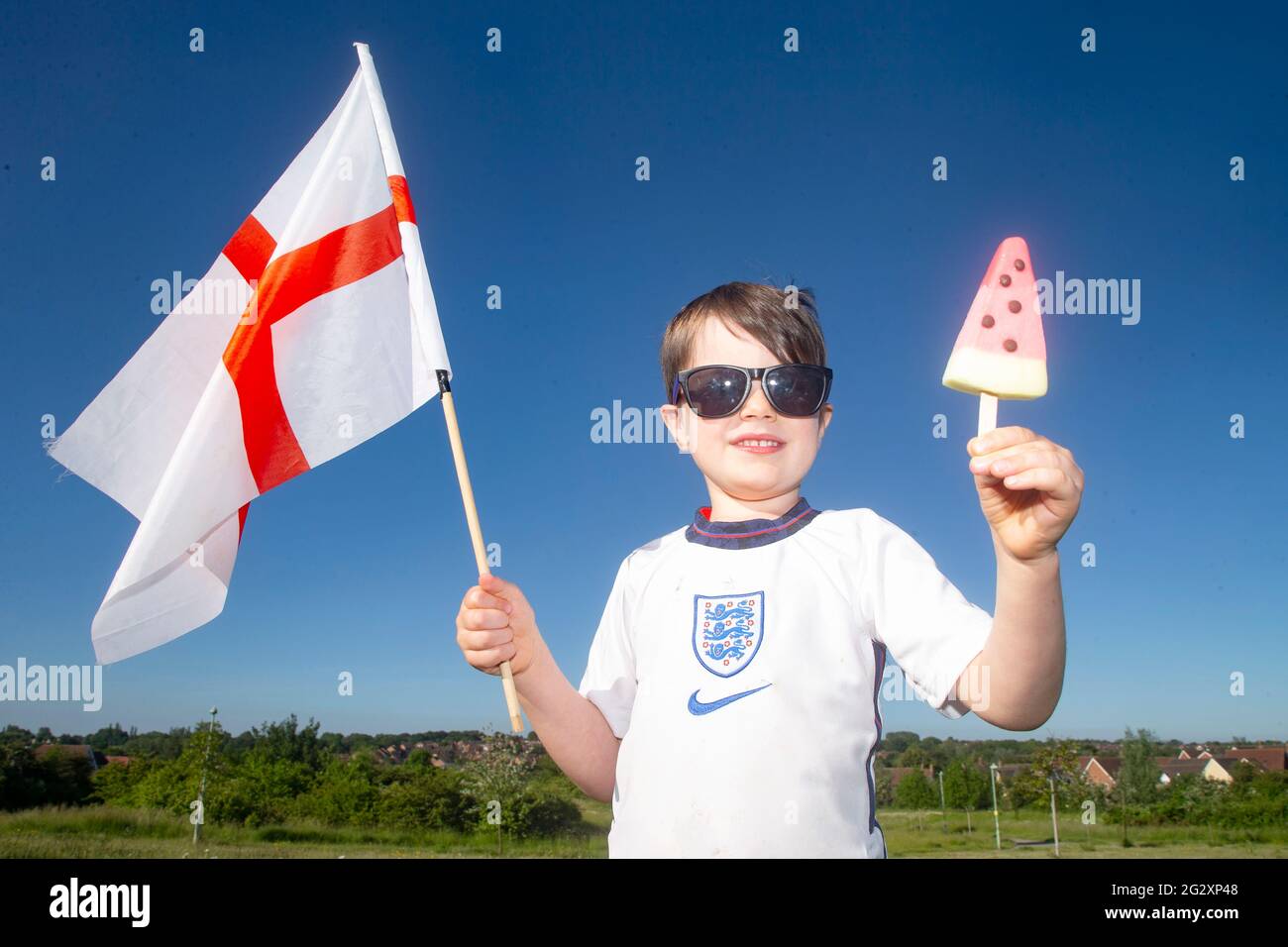 Cambridge. UK. 13th June 2021. Albert Mitchell, 4 in his England kit is ...