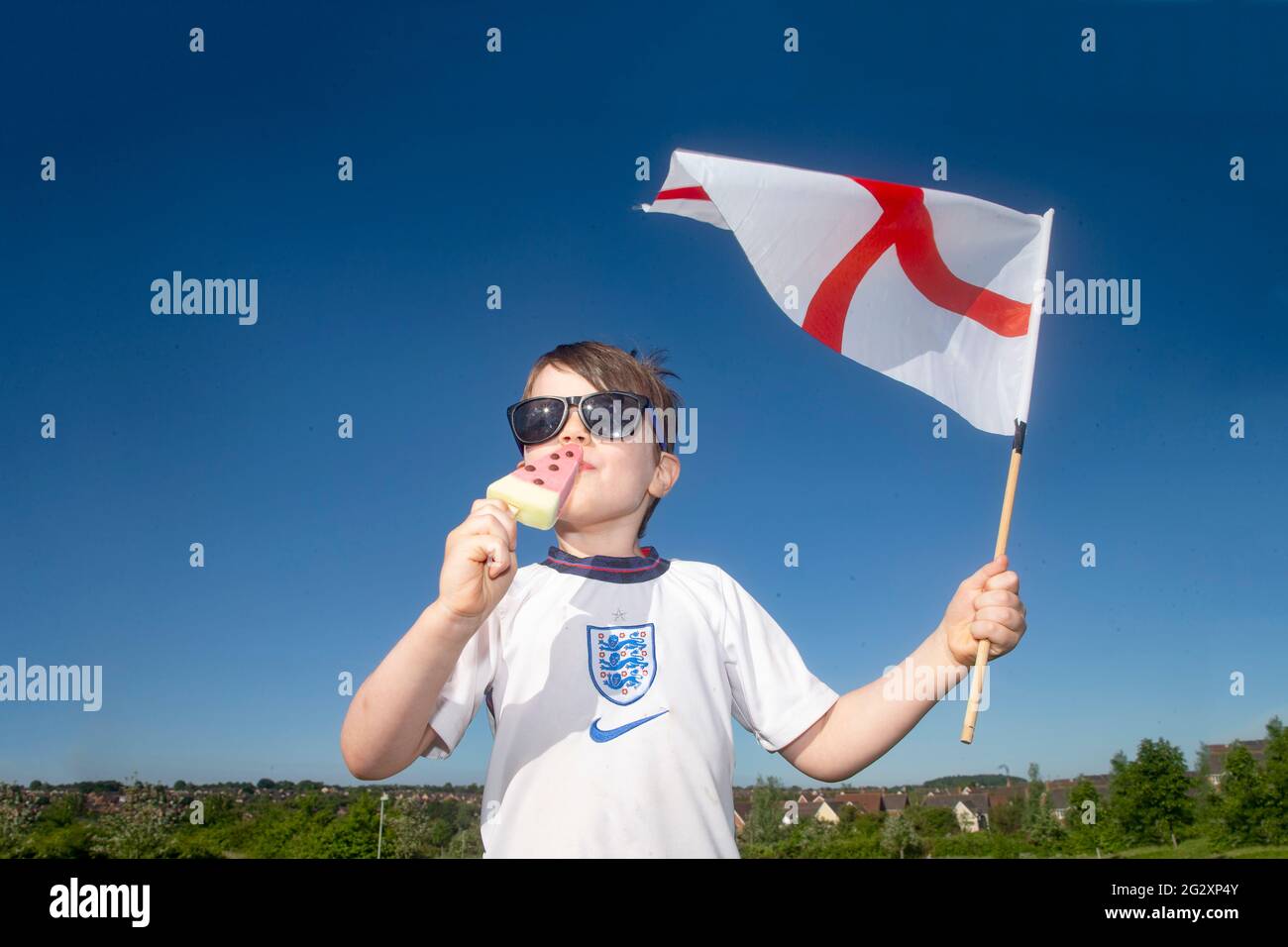 Cambridge. UK. 13th June 2021. Albert Mitchell, 4 in his England kit is ...