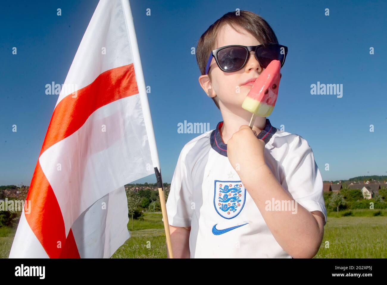 Cambridge. UK. 13th June 2021. Albert Mitchell, 4 in his England kit is ...