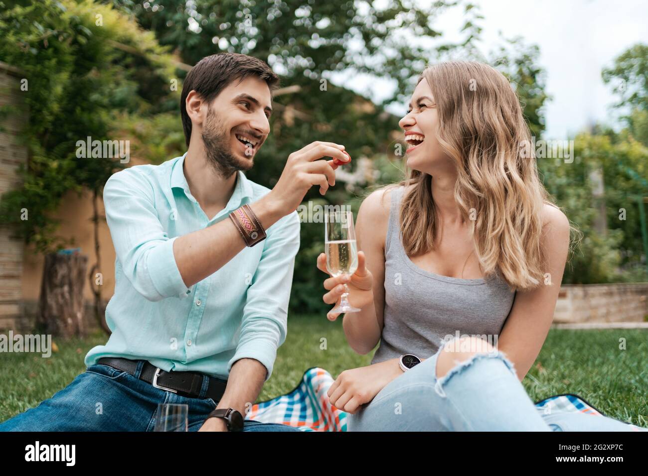 Couple feeding each other and holiday hi-res stock photography and ...