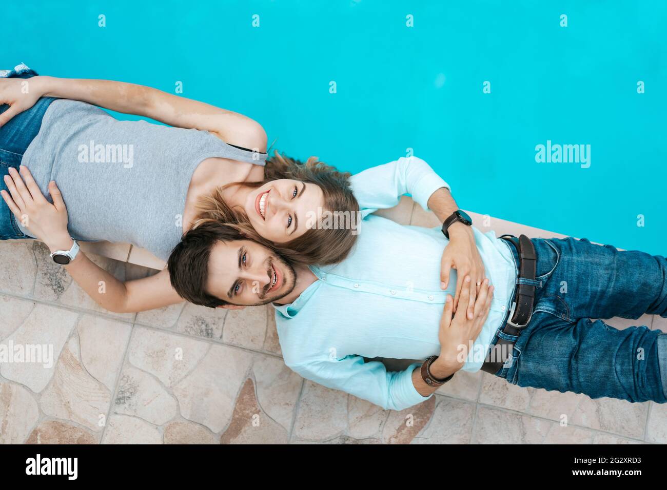 Woman pool jeans hi-res stock photography and images - Alamy