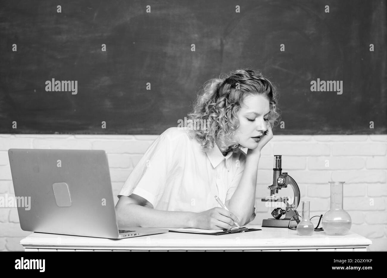 Wisdom. scientist at school lab. biology experiment research. make ...