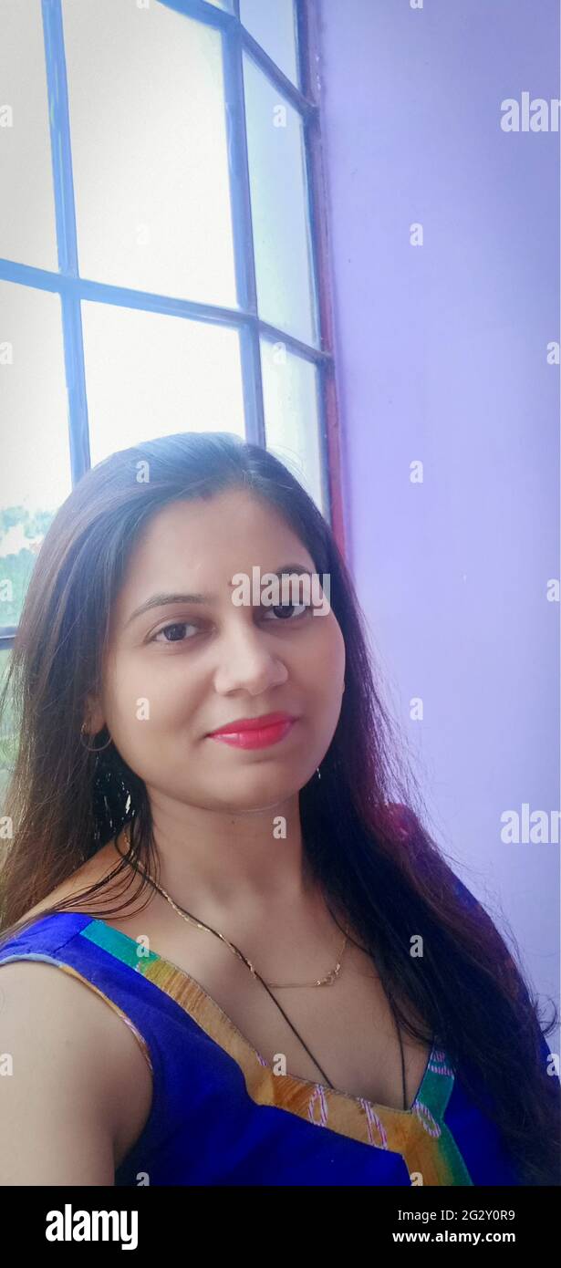 A Portrait of a Beautiful Young Woman, with cute smile and open long ...