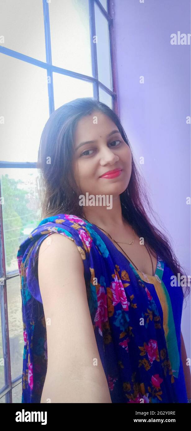 A Portrait of a Beautiful Young Woman, with cute smile and open long ...