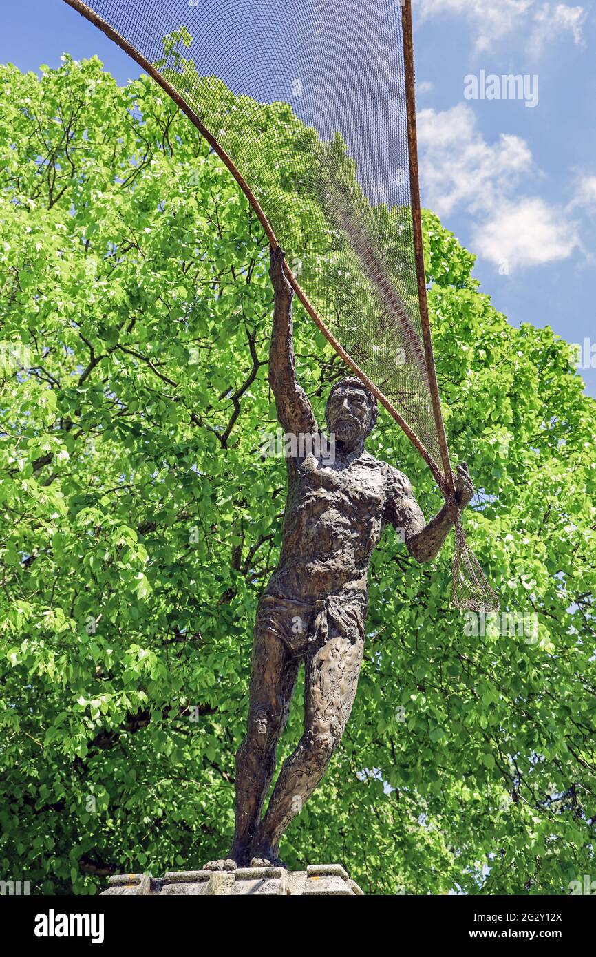 St Andrew the Fisherman sculpture by Rodney Munday outside the Minster ...