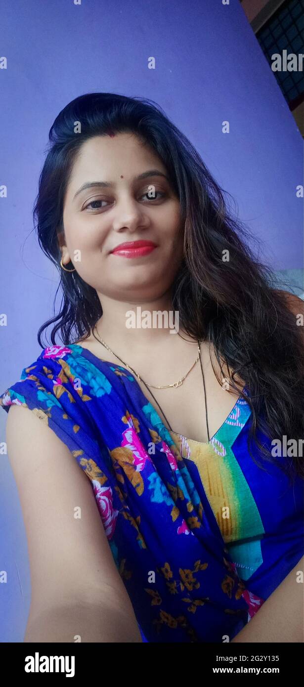 A Portrait of a Beautiful Young Woman, with cute smile and open long ...