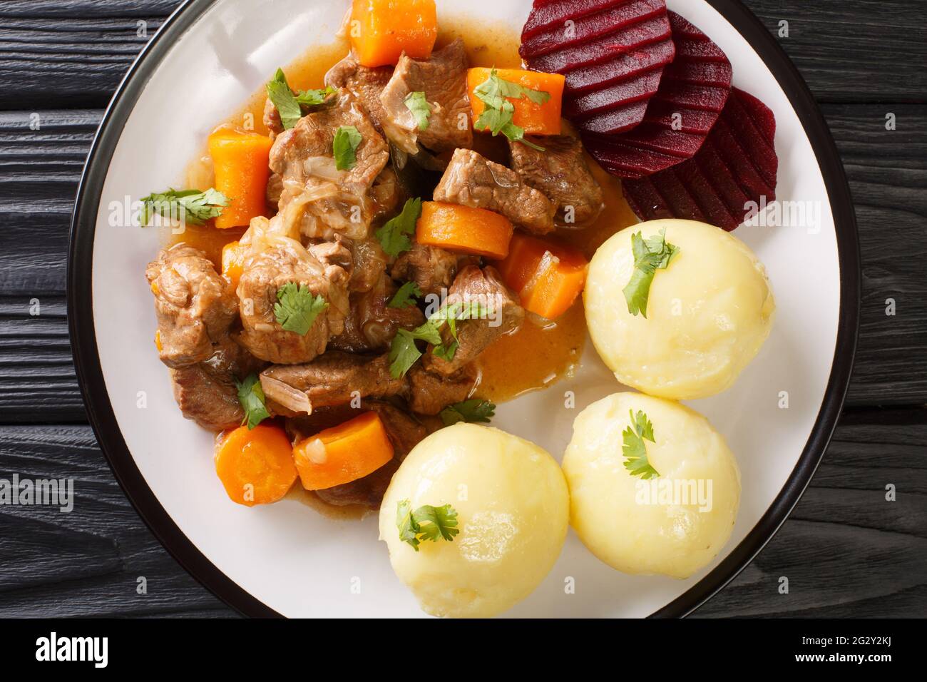 Swedish Beef Stew Kalops slow simmered with vegetables close up in the ...