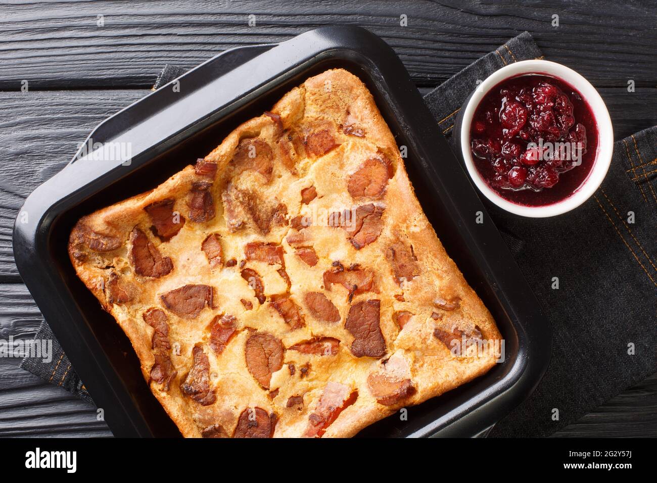 Oven Baked Swedish Bacon Pancake Flaskpannkaka close up in the baking ...