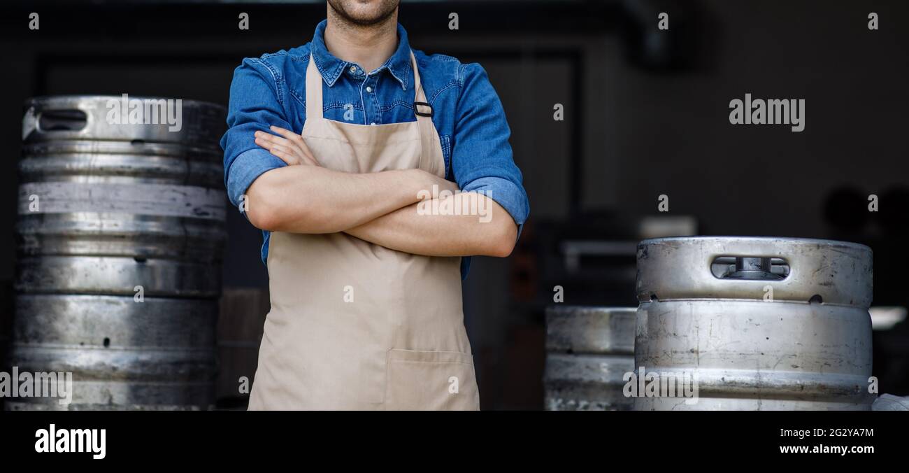 Modern businessman, employer, brewery owner and brewer at work in ...