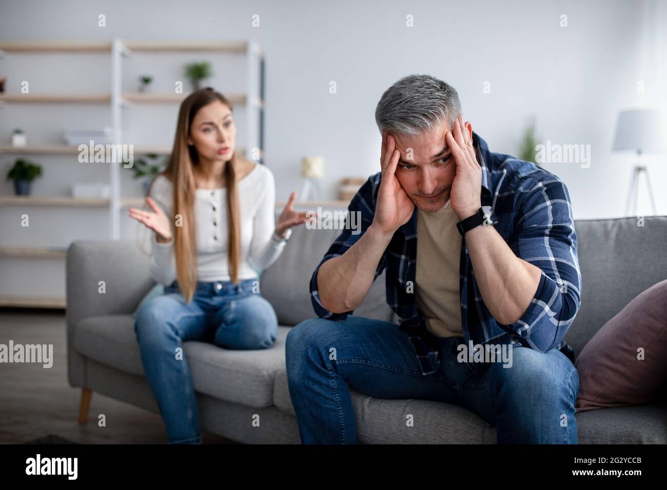 Frustrated mature lady shouting at her marriage partner, having ...