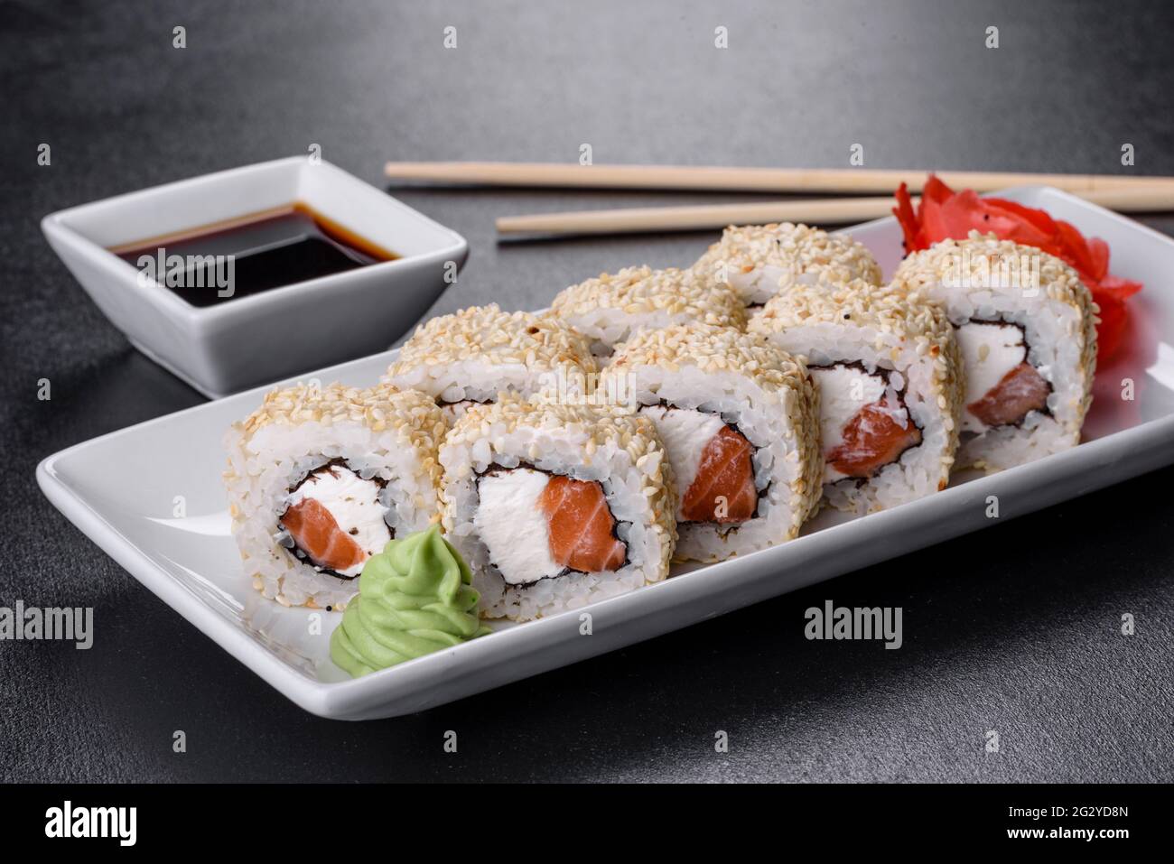 Sushi roll sushi with prawn, avocado, cream cheese, sesame. Sushi menu ...