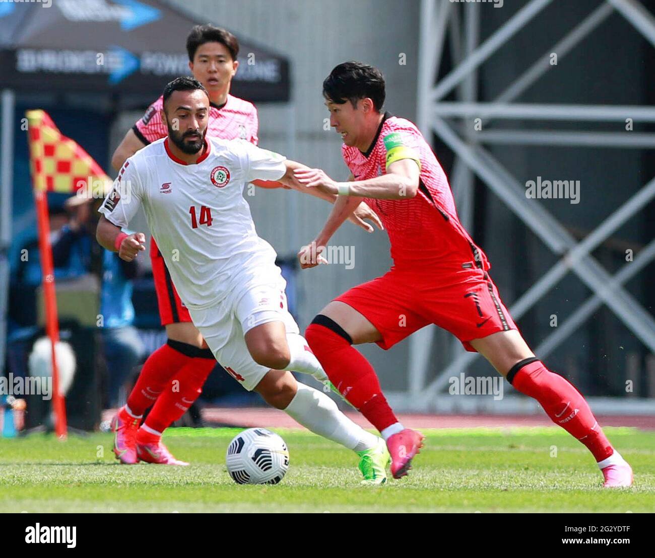 Goyang, South Korea. 13th June, 2021. Son Heungmin (R) of South Korea ...