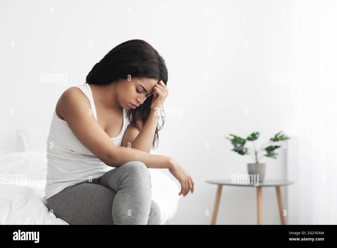 Stressed african american lady thinking about problem or having ...
