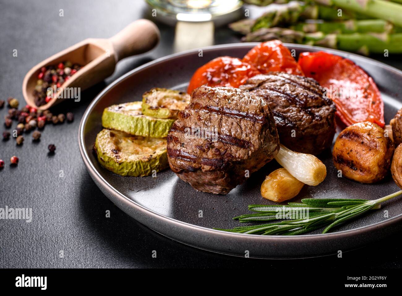 Tasty baked beef medallion with vegetables, mushrooms and spices ...