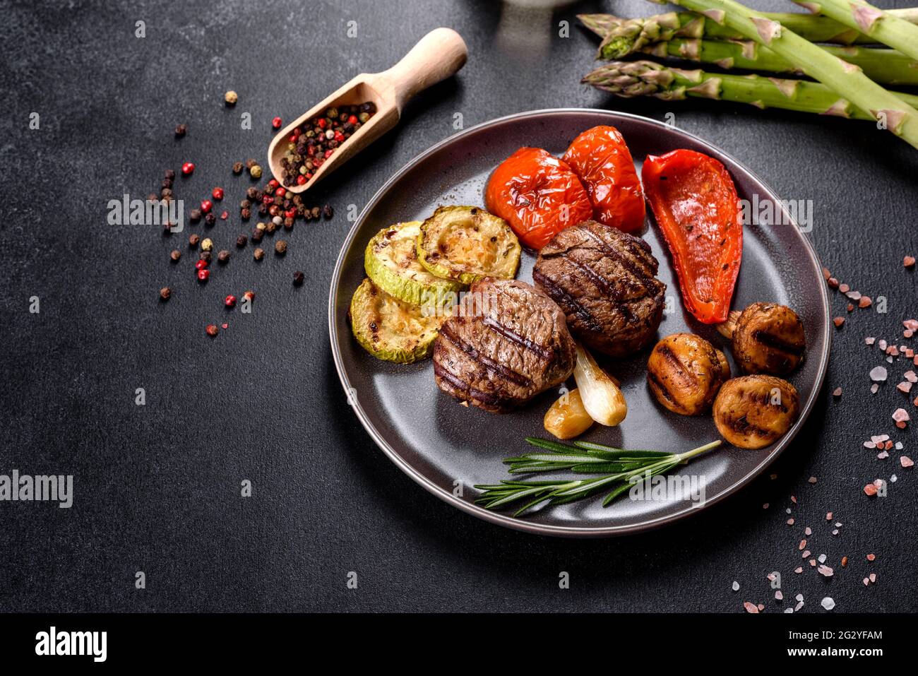 Tasty baked beef medallion with vegetables, mushrooms and spices ...