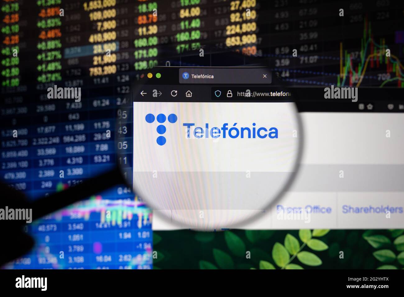Telefonica company logo on a website with blurry stock market ...