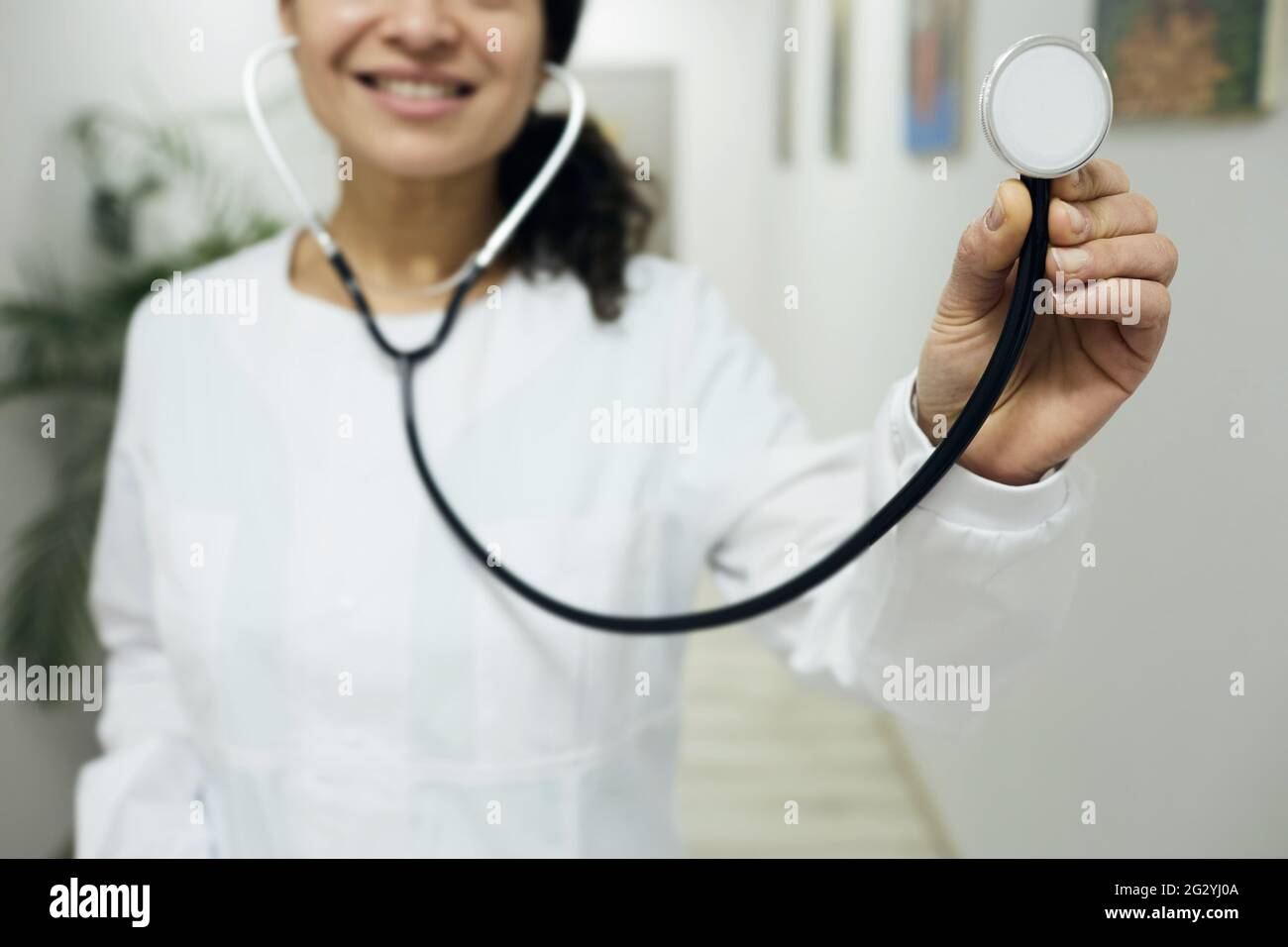doctor occupation. Female general practitioner wearing a medical coat ...