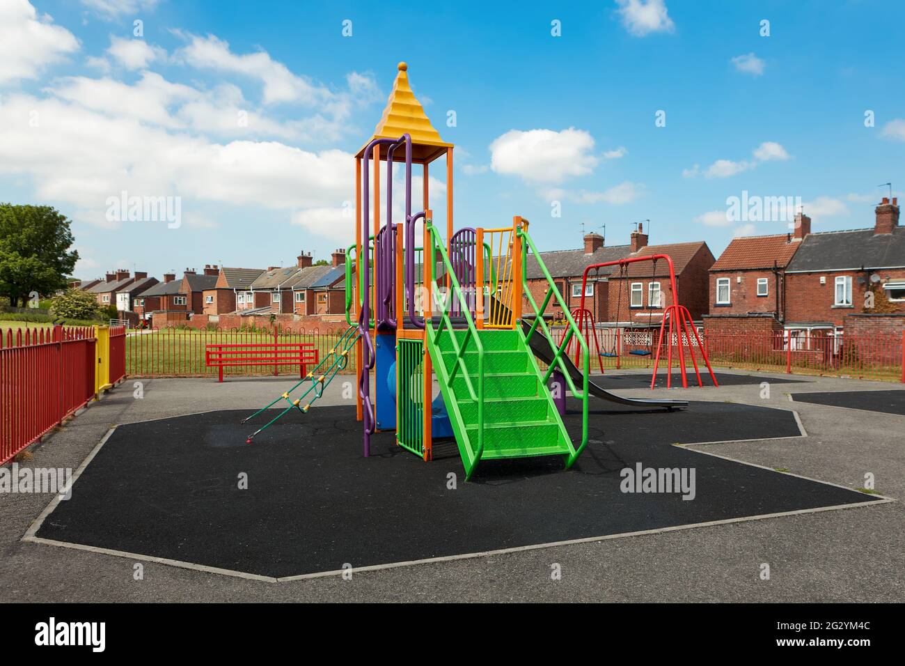 Playground and typical English architecture Stock Photo - Alamy