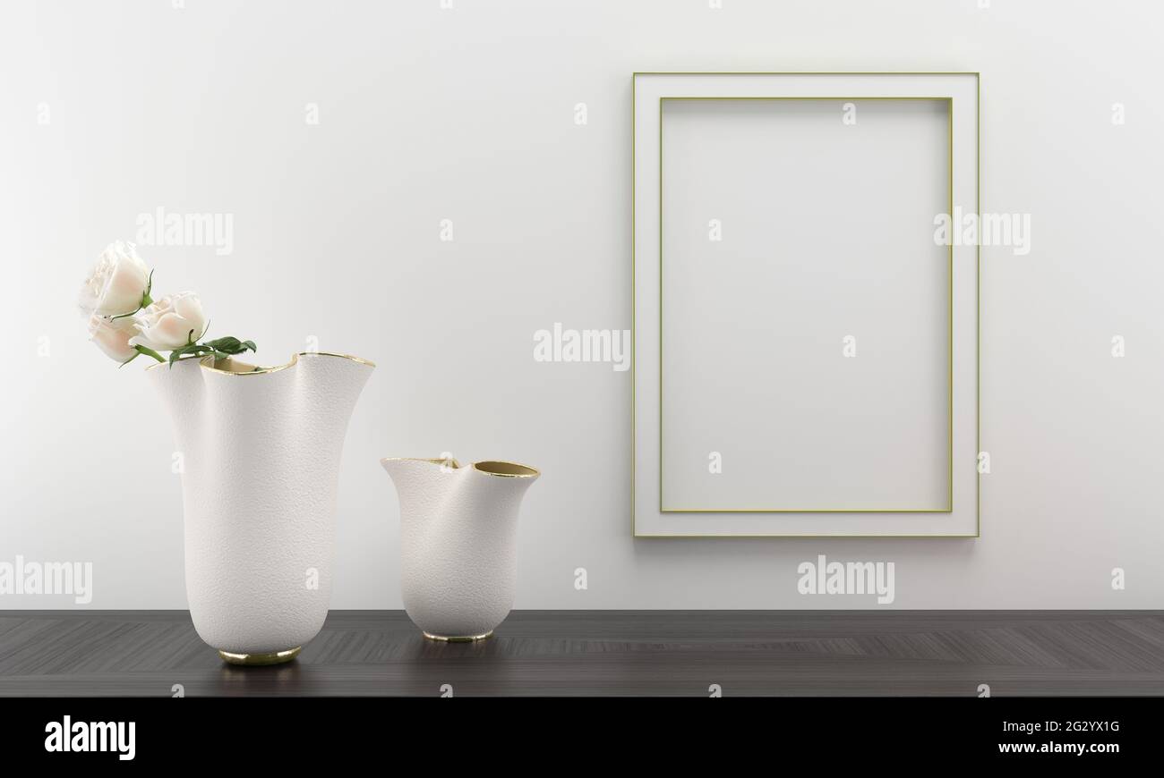 A closeup shot of flowers in a vase next to a frame on a white wall ...