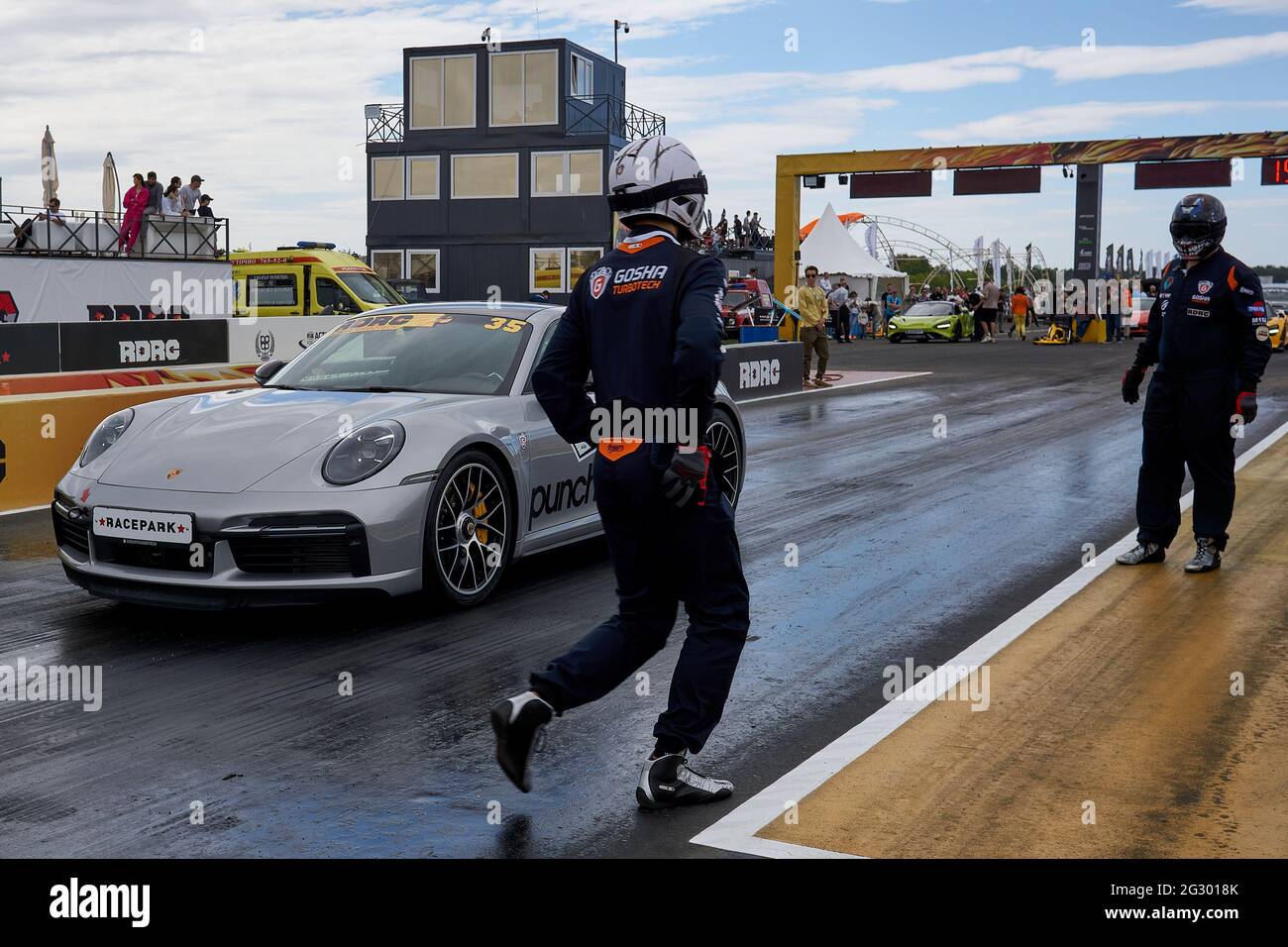 Moscow, Russia. 5th June, 2021. Technicians stand next to a gray ...