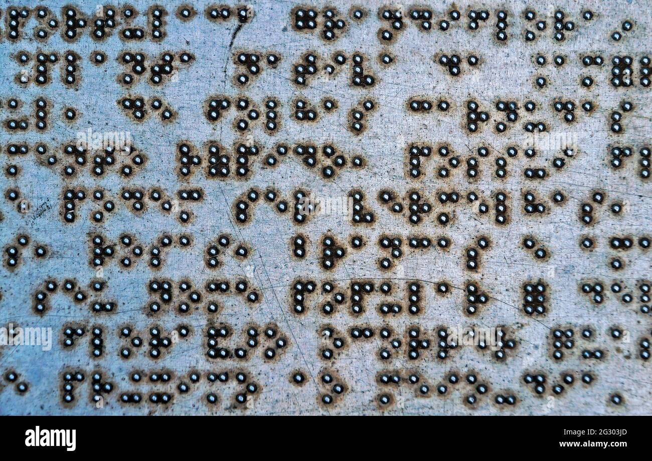 Metal plate written in Braille letters Stock Photo - Alamy