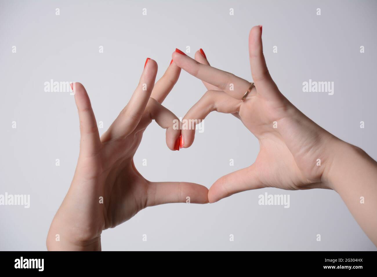 I love you gesture, female hands shape heart , expresses love Stock ...