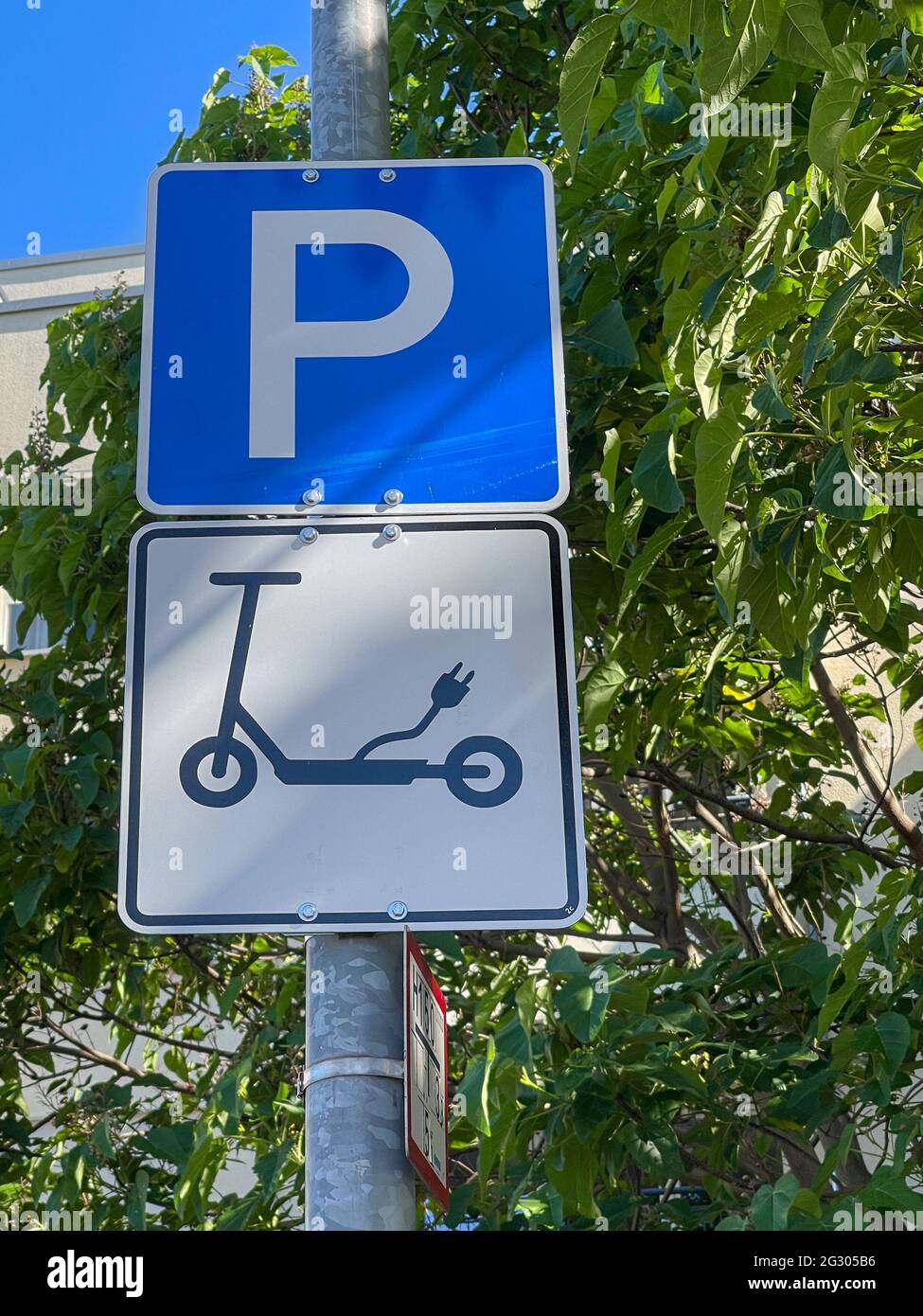 Electric scooter charging station, electric mobility in the city. Info ...