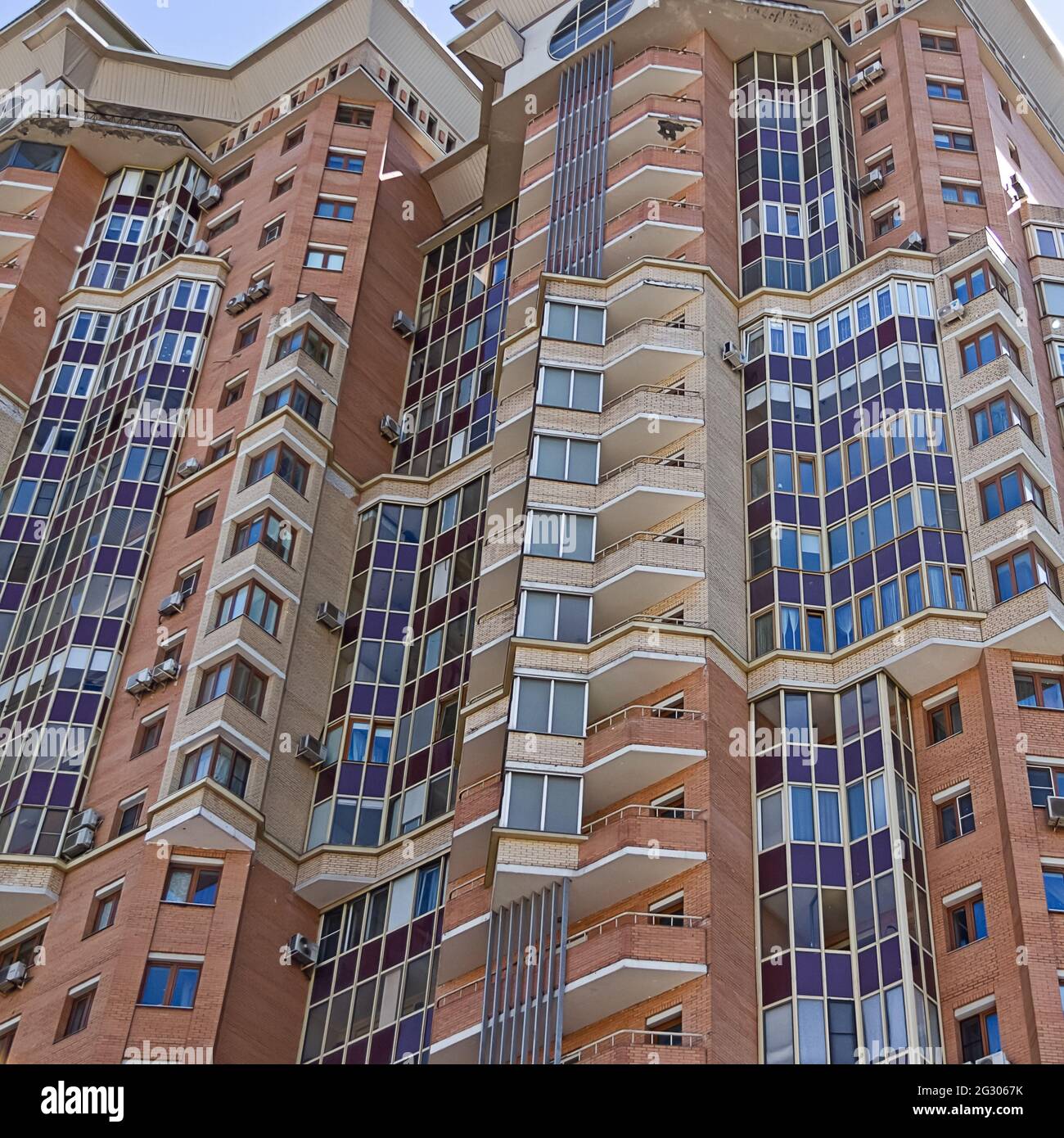 Facade of a high-rise apartment building. Typical city development ...