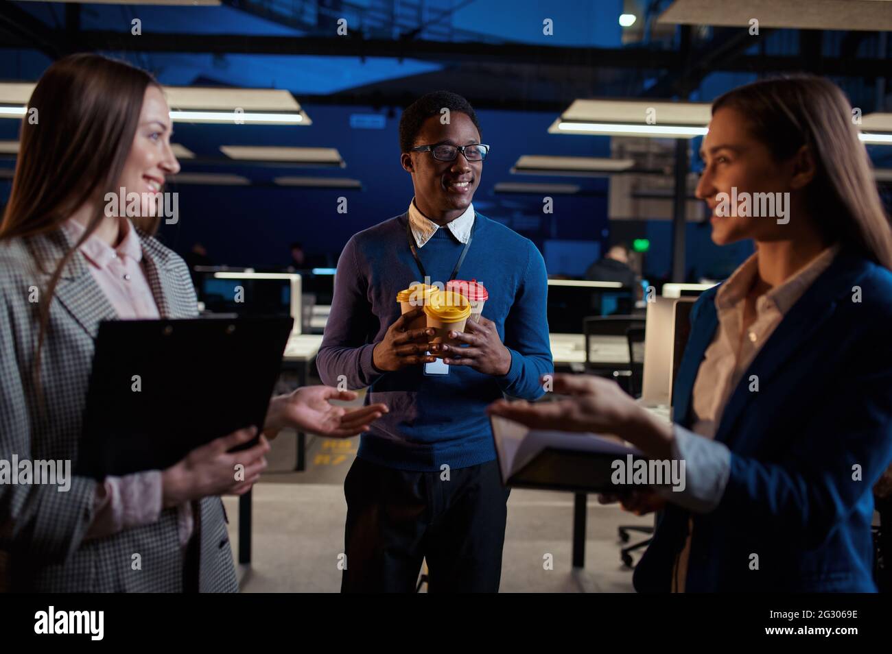 Cheerful managers in office hi-res stock photography and images - Alamy