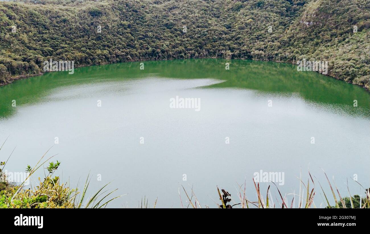 A circular volcanic lagoon in Guatavita, Colombia Stock Photo - Alamy
