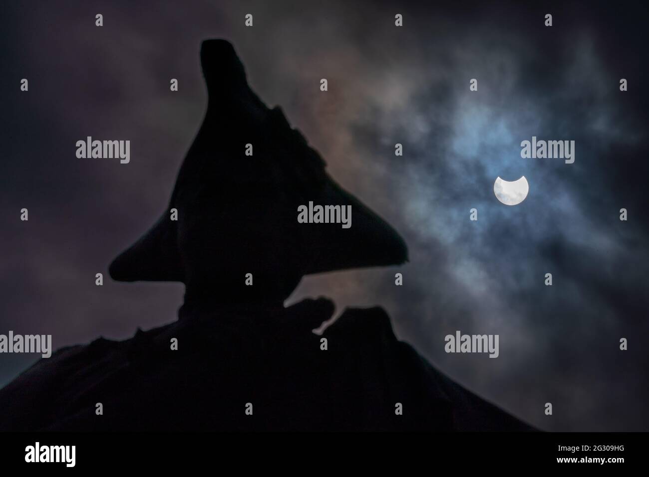 UK Weather: Partial solar eclipse seen from Greenwich Park reaches its ...