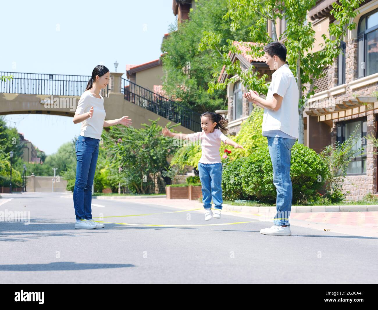 Mother and daughter jumping rope hi-res stock photography and images ...