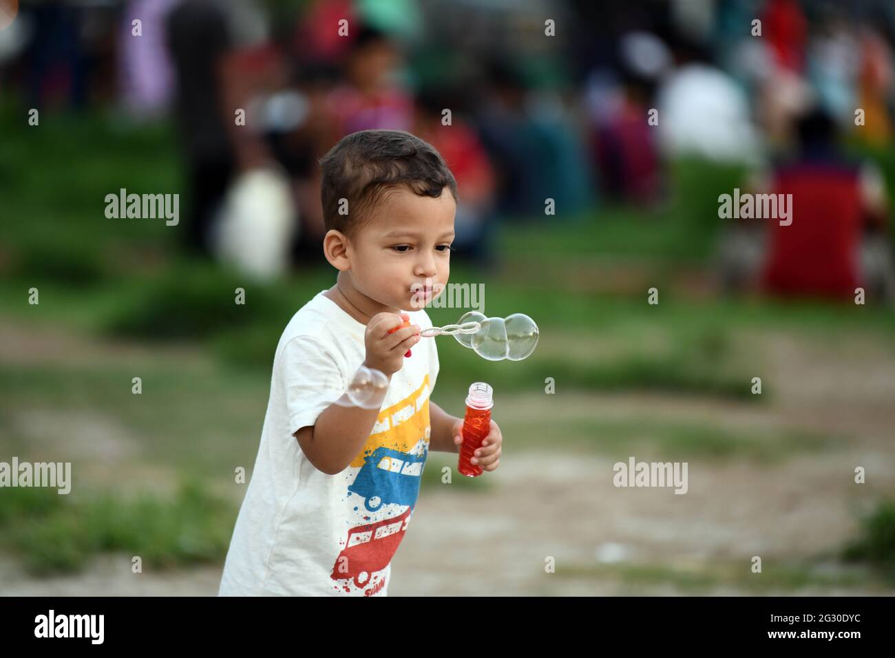 A kid is seen playing at Hatirjheel park in Dhaka. (Photo by Piyas Biswas / SOPA Images/Sipa USA ...