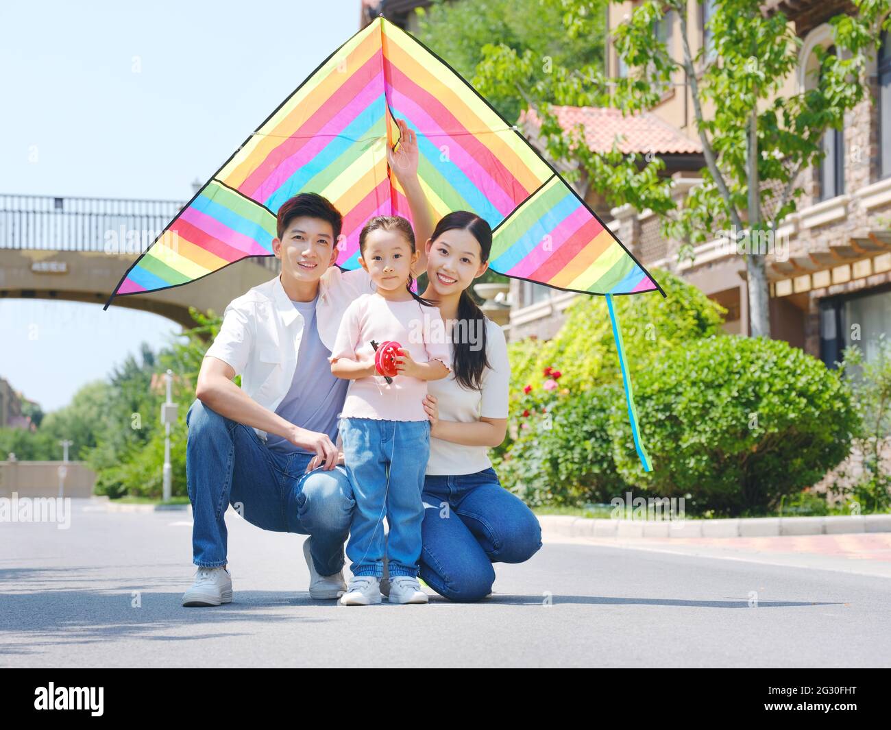 Happy family of three flying kites outdoors high quality photo Stock ...