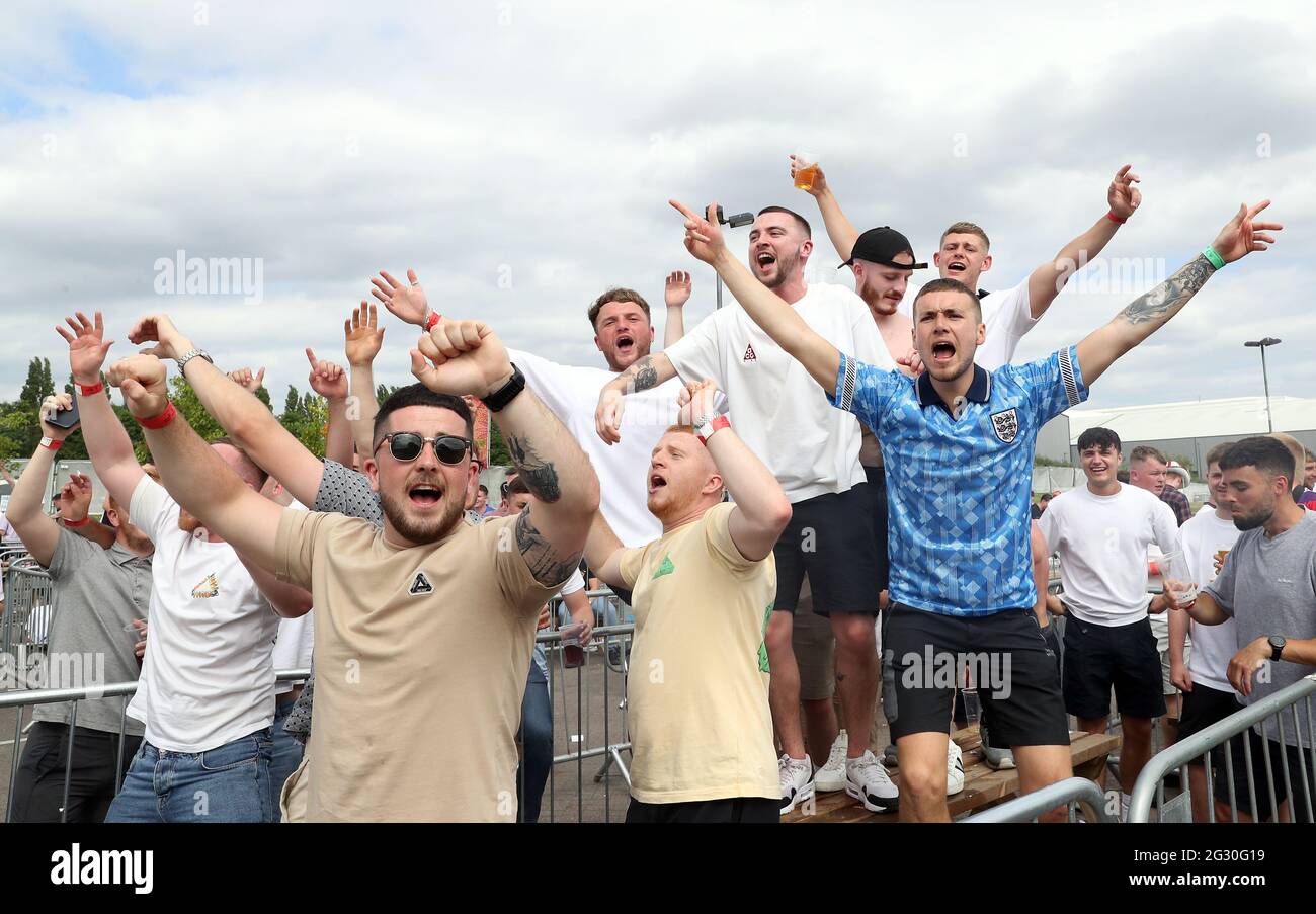 England fans celebrate their win at the fan zone in Trafford Park ...