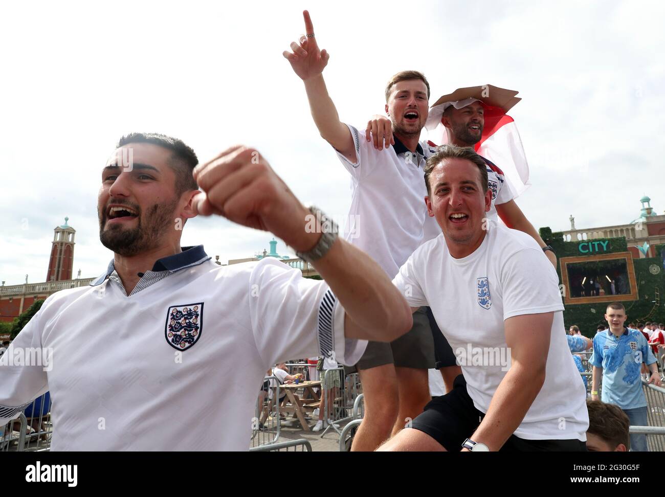 England fans celebrate their win at the fan zone in Trafford Park ...
