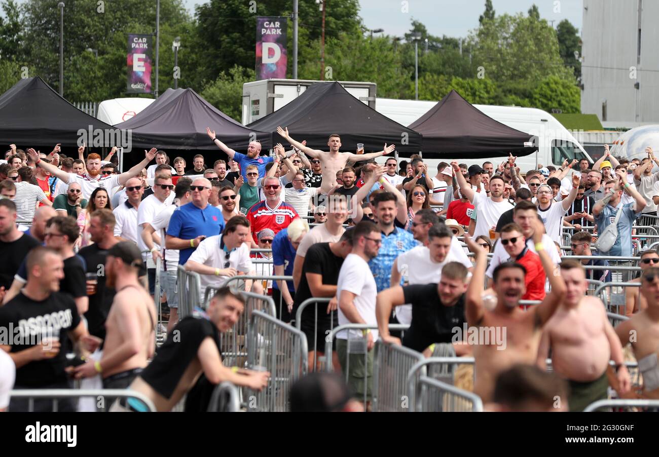 England fans celebrate their win at the fan zone in Trafford Park ...