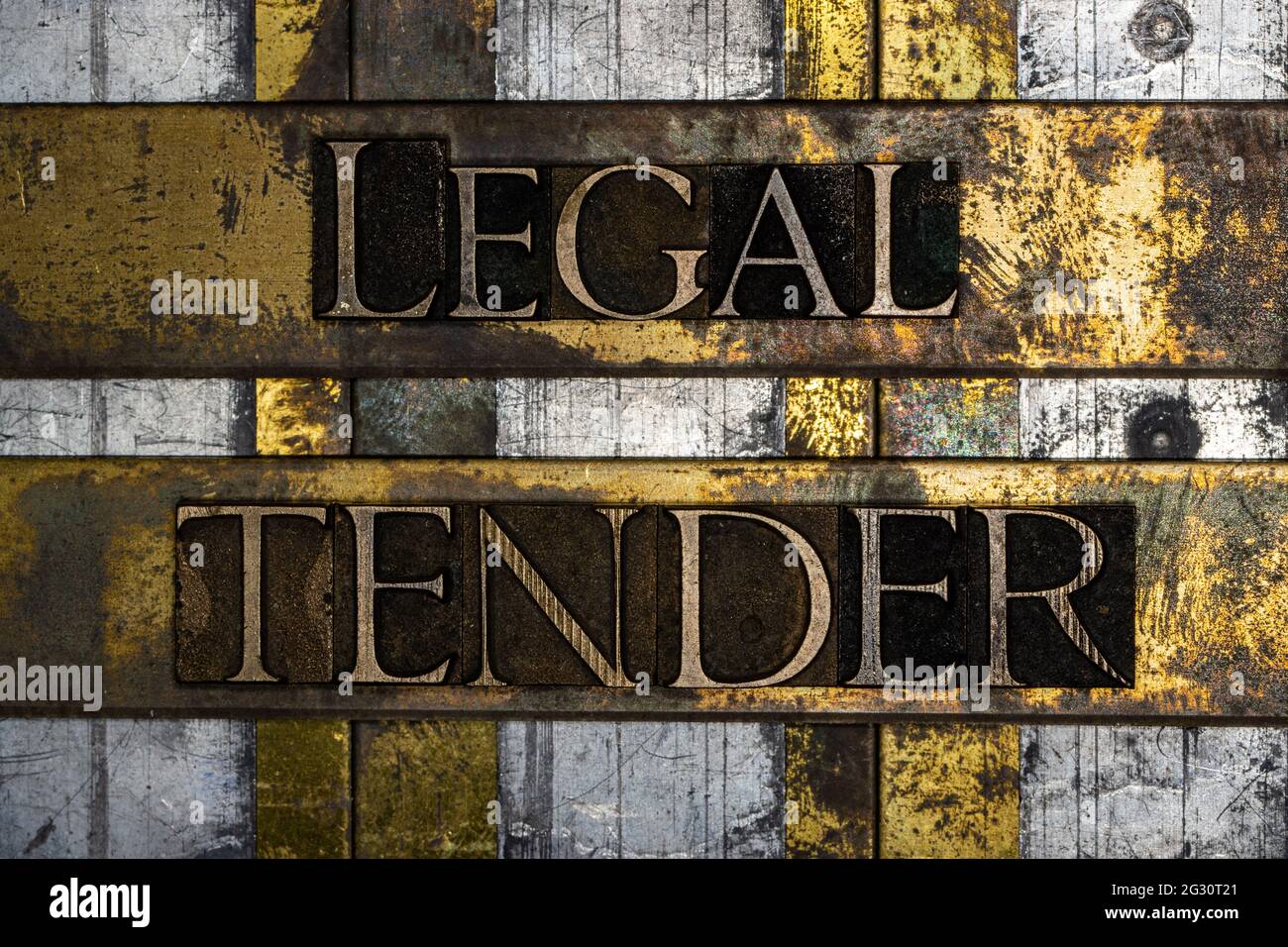Legal Tender text on vintage textured grunge copper and gold bar ...