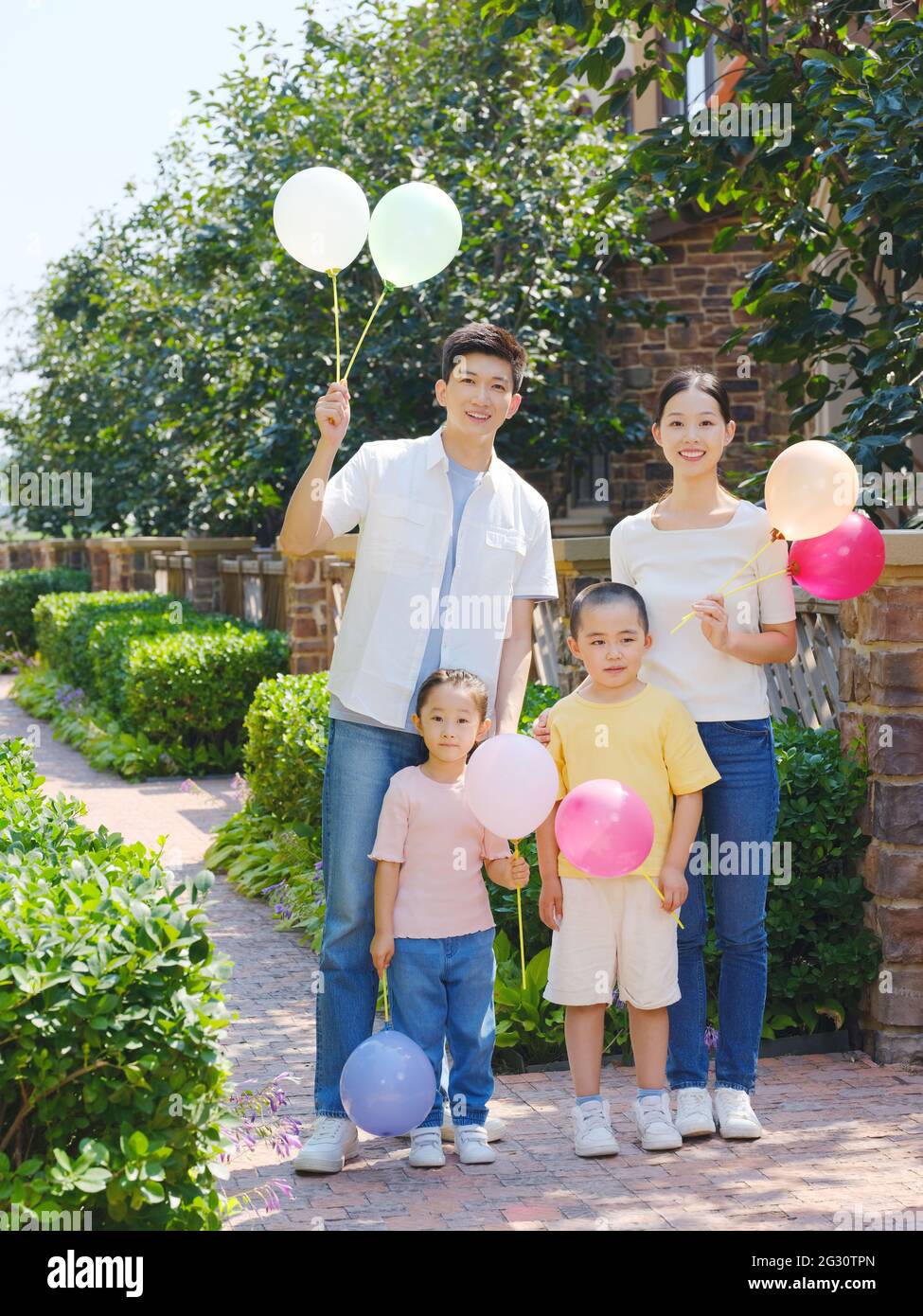 Happy family of four in the outdoor group photo high quality photo ...
