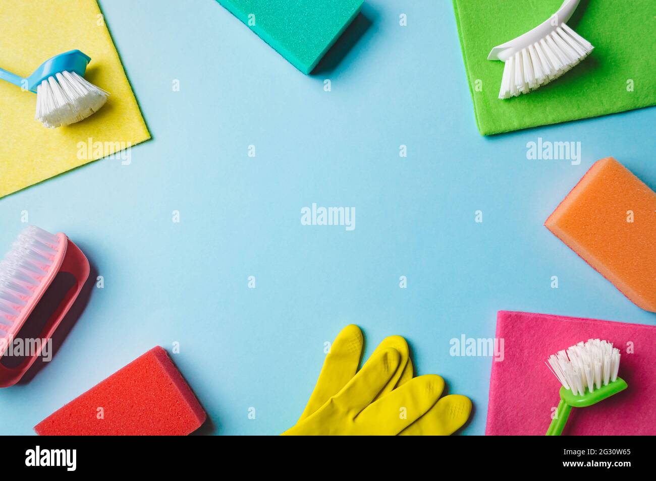 House cleaning product on blue background, copy space. Flat lay or top ...