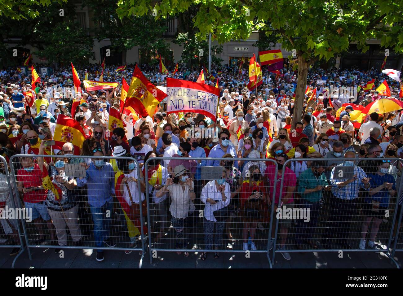 Madrid, Spain. 13th June, 2021. Protesters gather while holding Spanish ...
