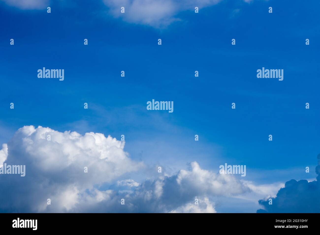 Blue sky and white clouds with daylight background Stock Photo - Alamy