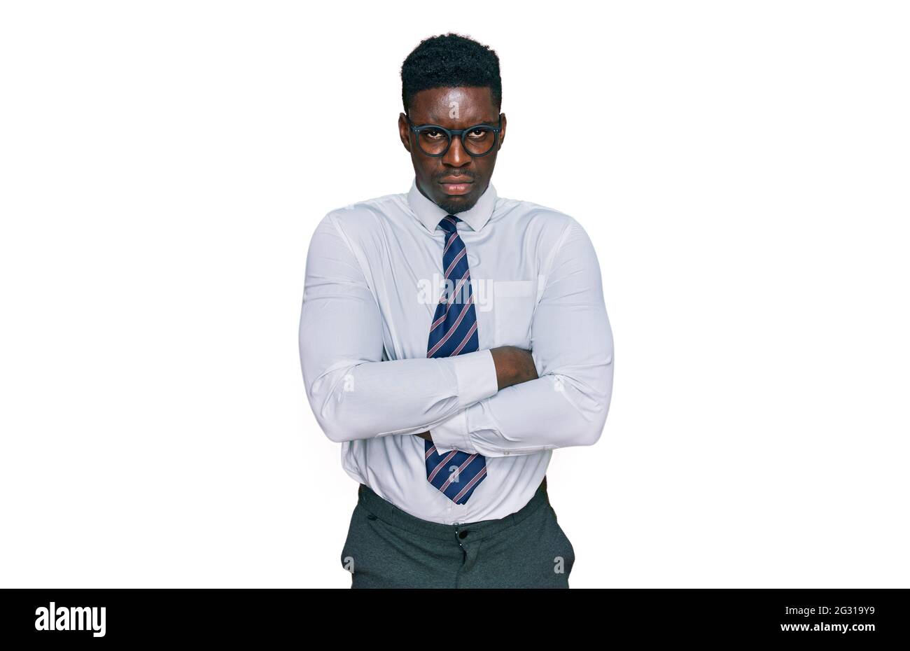 Handsome business black man wearing white shirt and tie skeptic and nervous, disapproving ...