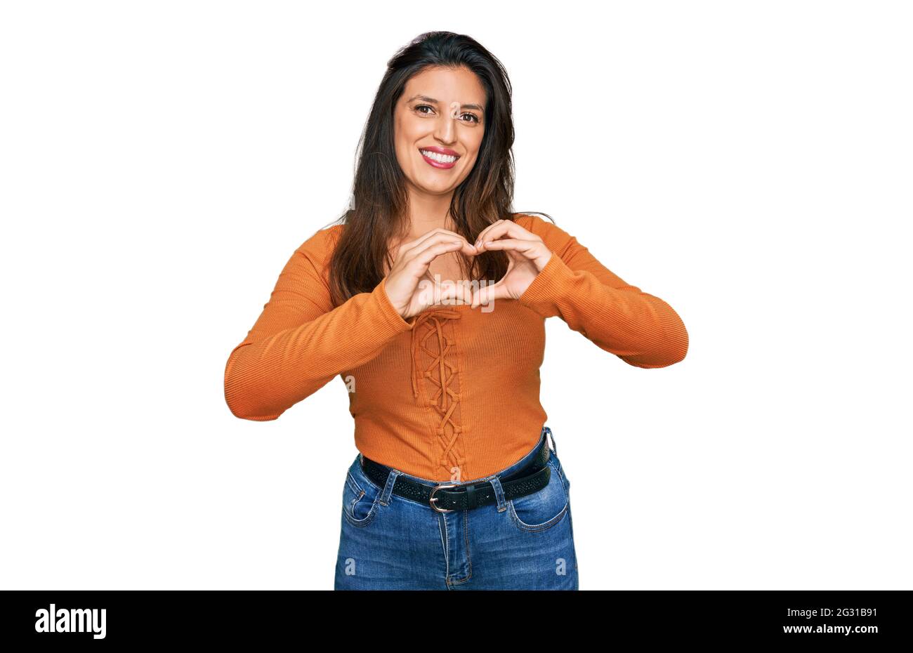 Beautiful hispanic woman wearing casual clothes smiling in love showing ...