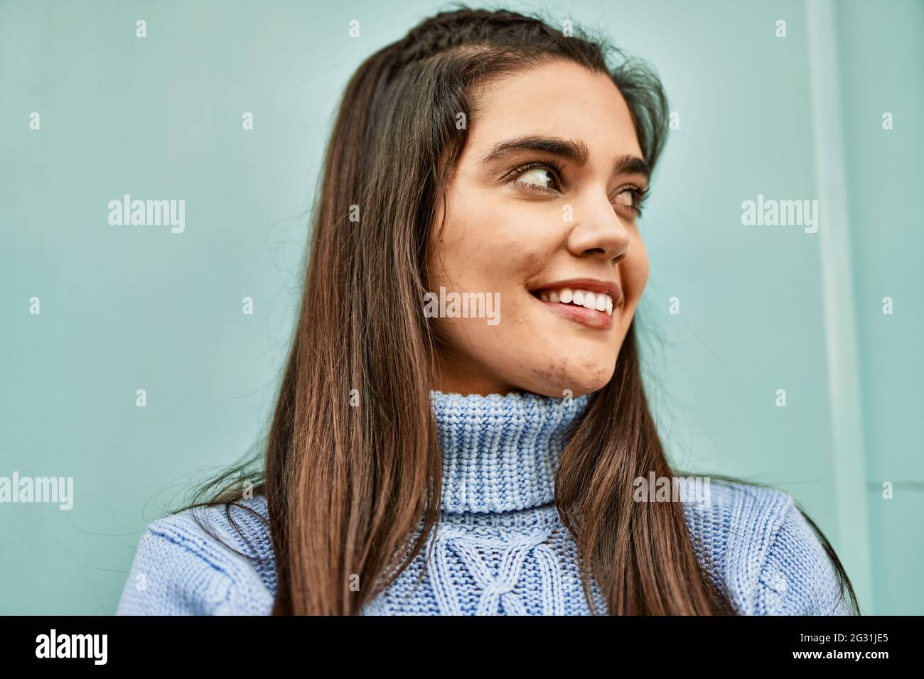 Young hispanic girl smiling happy standing at the city Stock Photo - Alamy