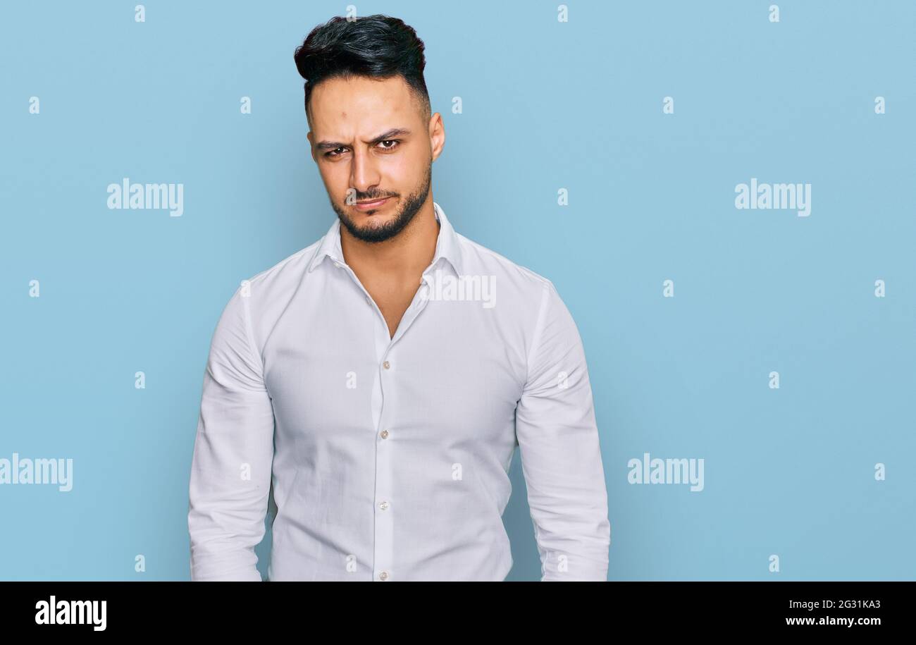 Young arab man wearing casual clothes skeptic and nervous, frowning ...