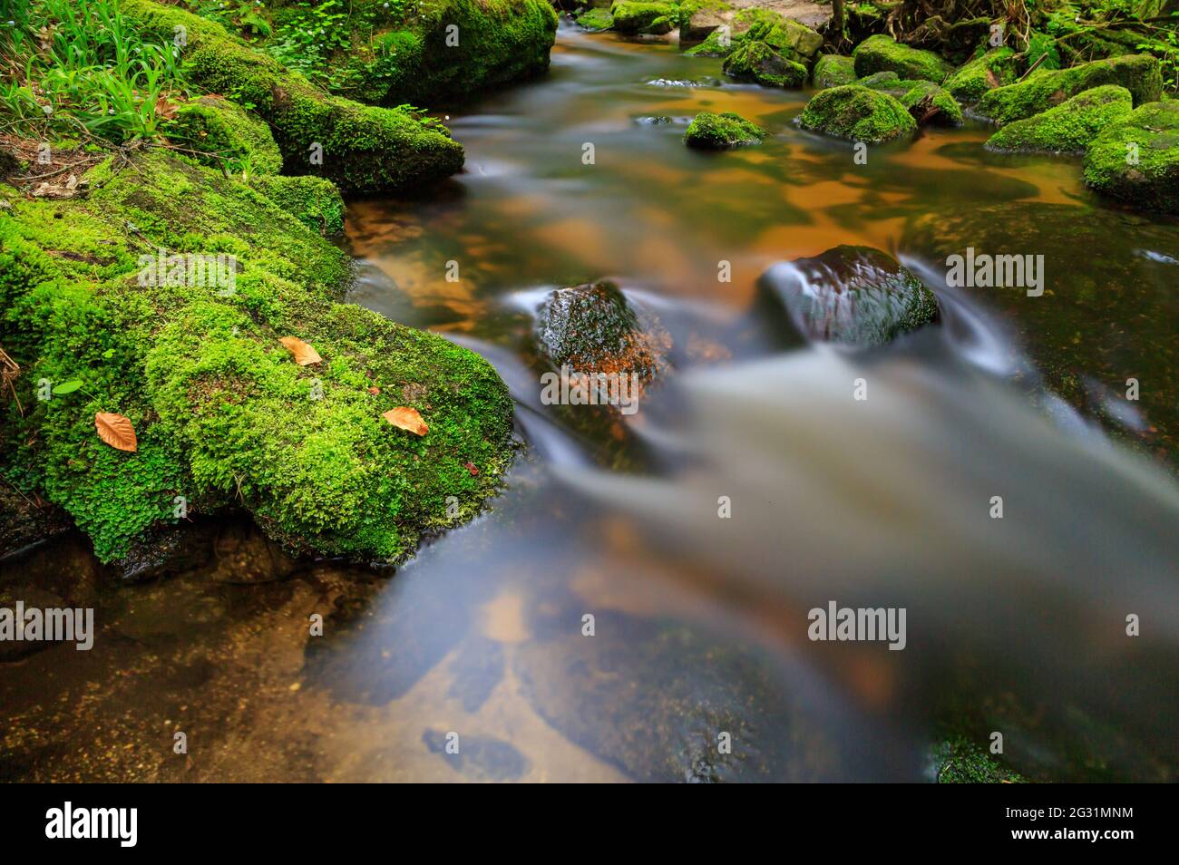 Beautiful waterfall with smooth water. This image has a flim grain ...